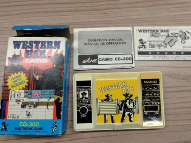 1990年 CG-300 Casio Western Bar 經典中古懷舊 西部牛仔酒吧大戰 手提掀蓋遊戲機 有盒有書 操作正常 7 80後 ...
