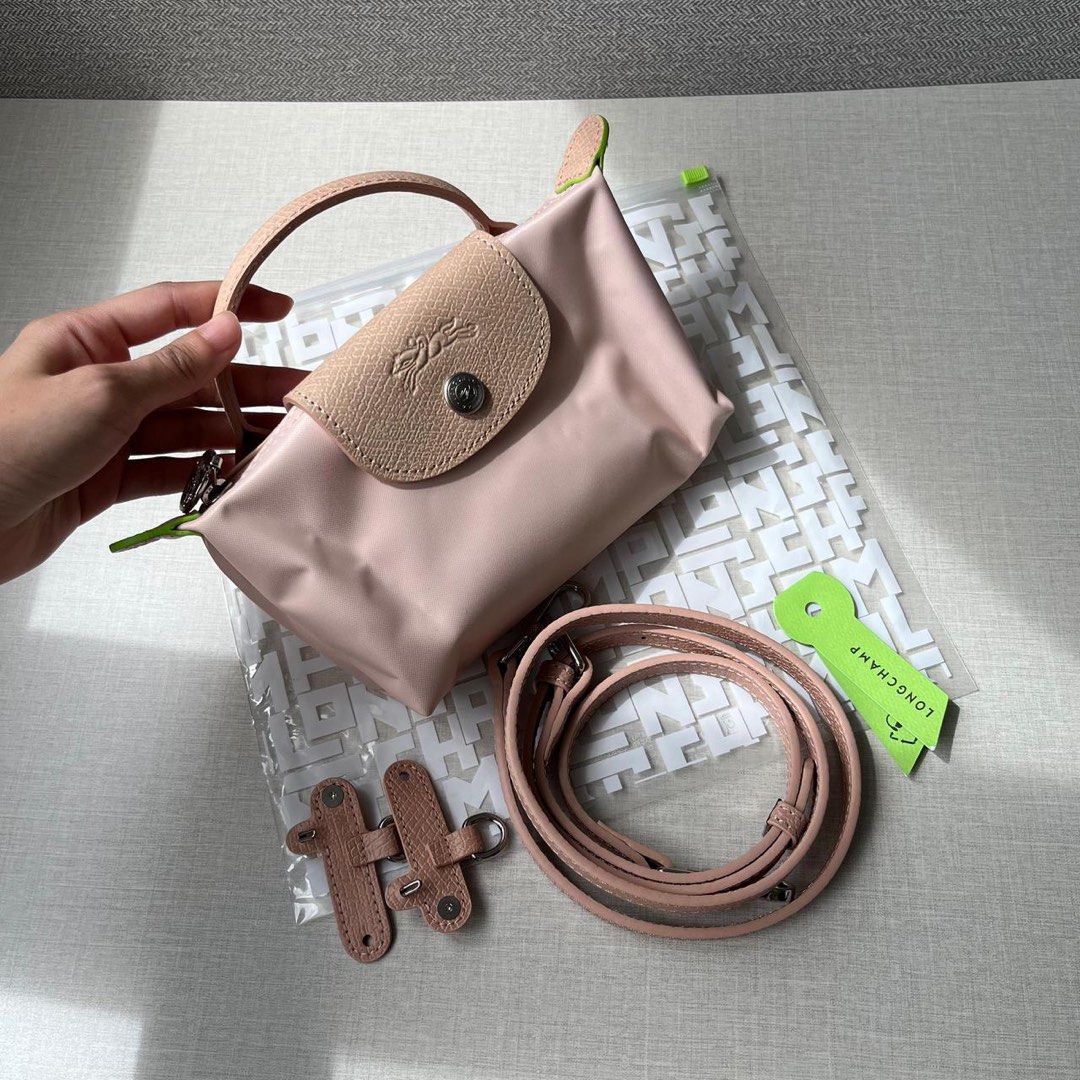 Longchamp Fleurs Pouch Bag, Fesyen Wanita, Tas & Dompet di Carousell
