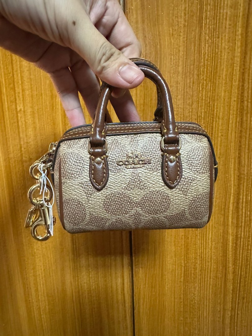 Coach Mini Rowan bag charm brown signature, Luxury, Bags & Wallets on ...