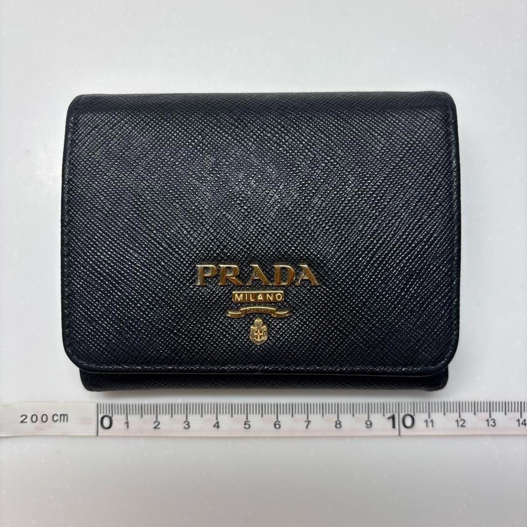 Authentic PRADA bi-fold wallet black leather, Luxury, Bags & Wallets on Carousell