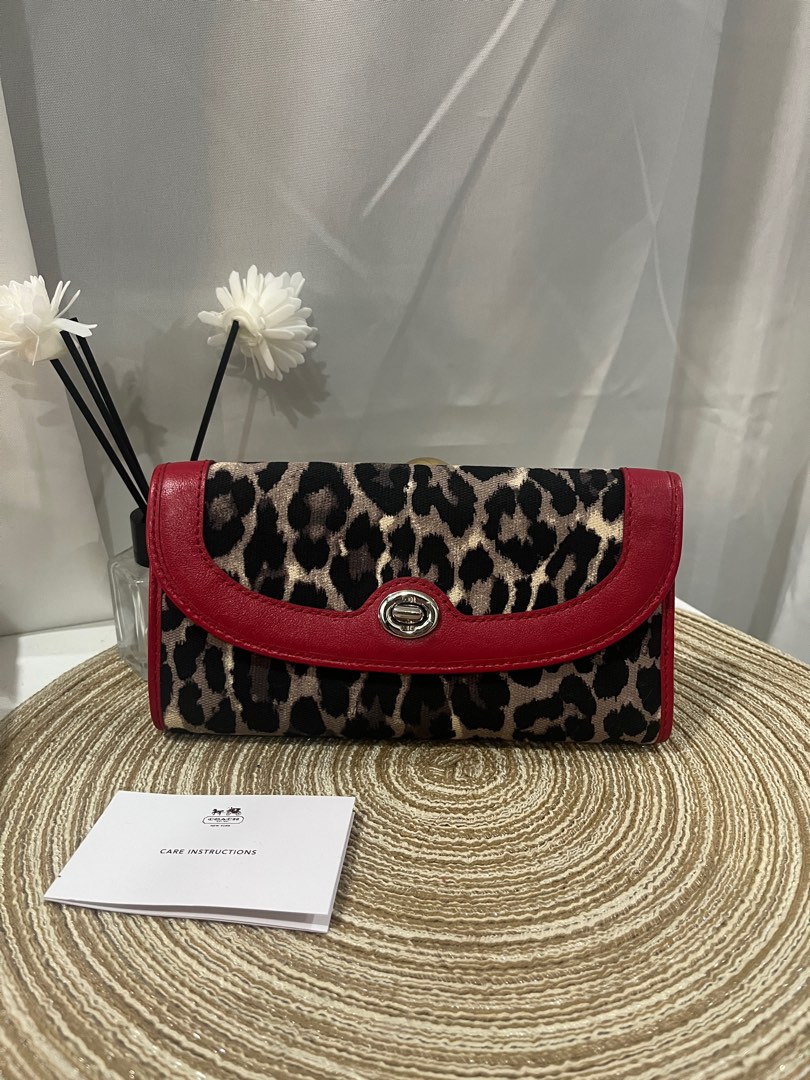 coach trifold animal print wallet, Luxury, Bags & Wallets on Carousell