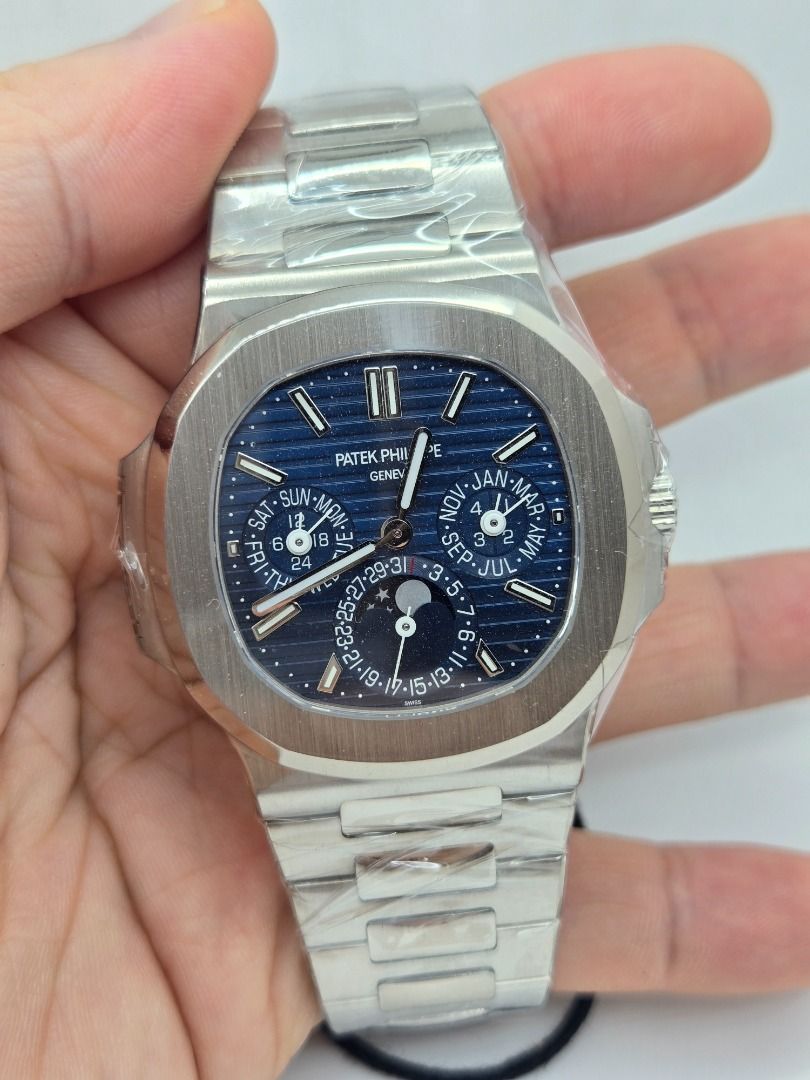 Patek Philippe 5740/1G Nautilus Perpetual Calendar White Gold Blue Dial ...