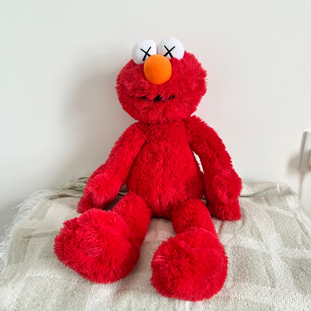 Elmo kaws x sesame street uniqlo, Hobbies & Toys, Toys & Games on Carousell
