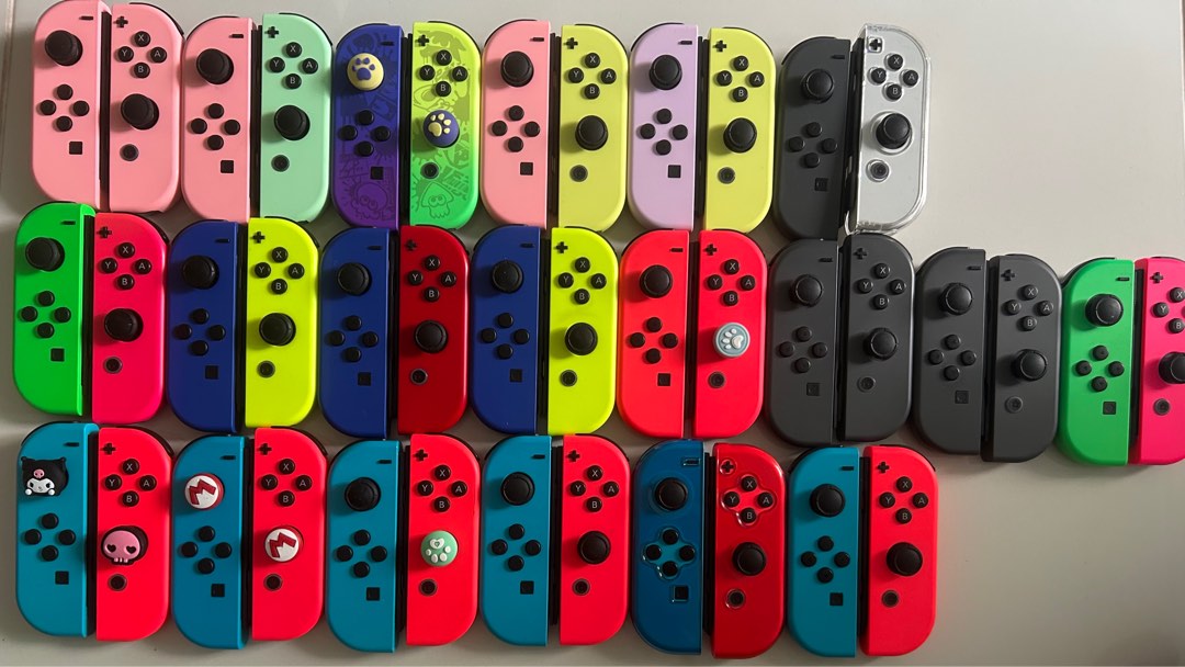 Nintendo Switch Joycons original used x 60 pairs left, Video Gaming ...