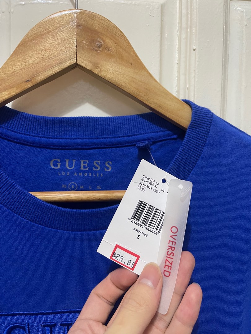 Guess original tshirt blue with price tag, Men's Fashion, Tops & Sets ...