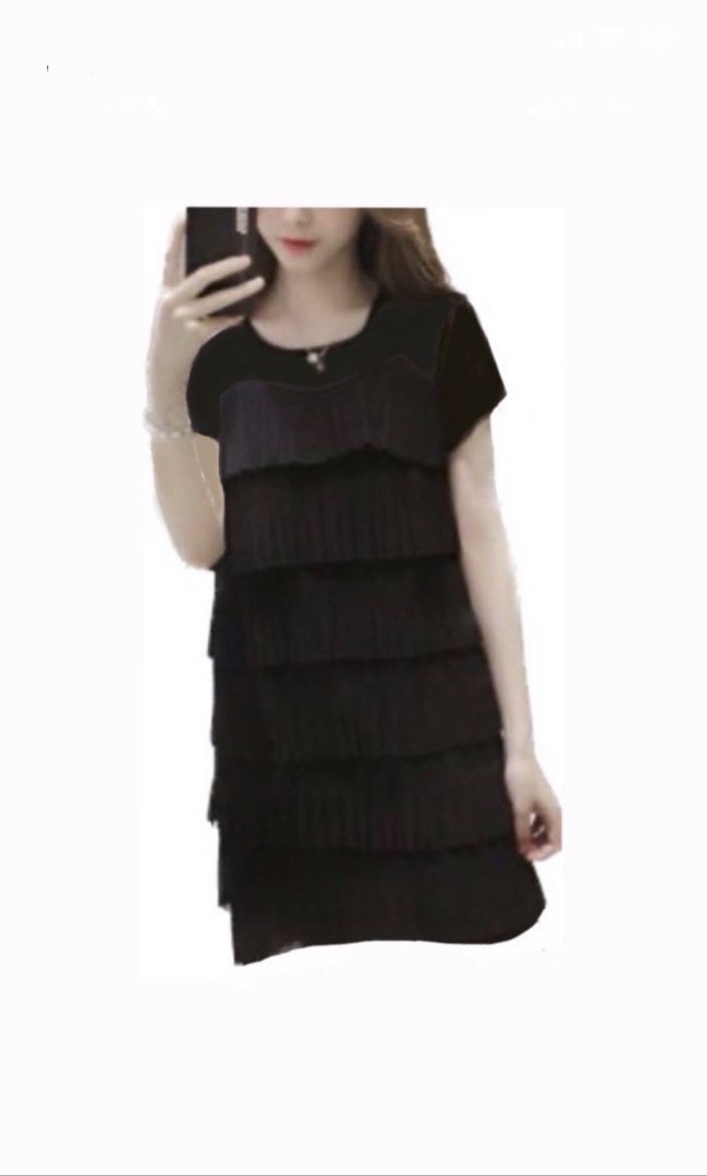 Black Multi-layered Dress reminiscent of Parisian Haute Couture and ...