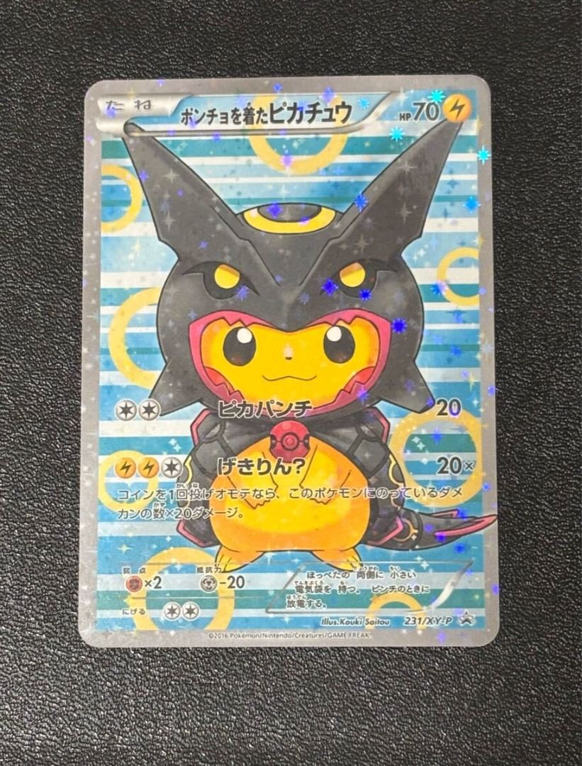 Good condition Pokemon card Pikachu wearing a poncho Black Rayquaza ...