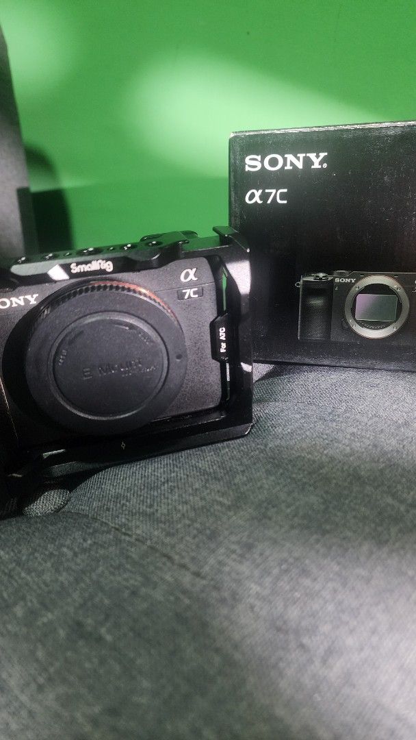 Sony A7C with cage smallrig, Photography, Cameras on Carousell