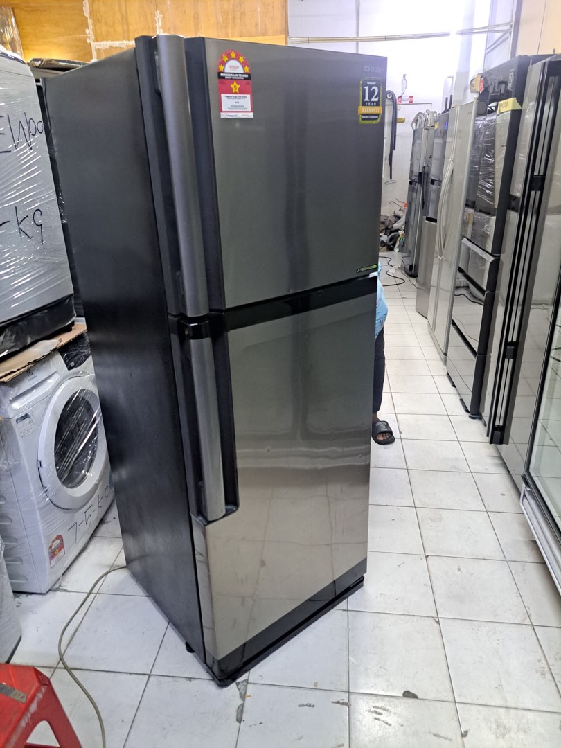 SHARP Fridge freezer 2 door good condition one month warntey ada, TV ...