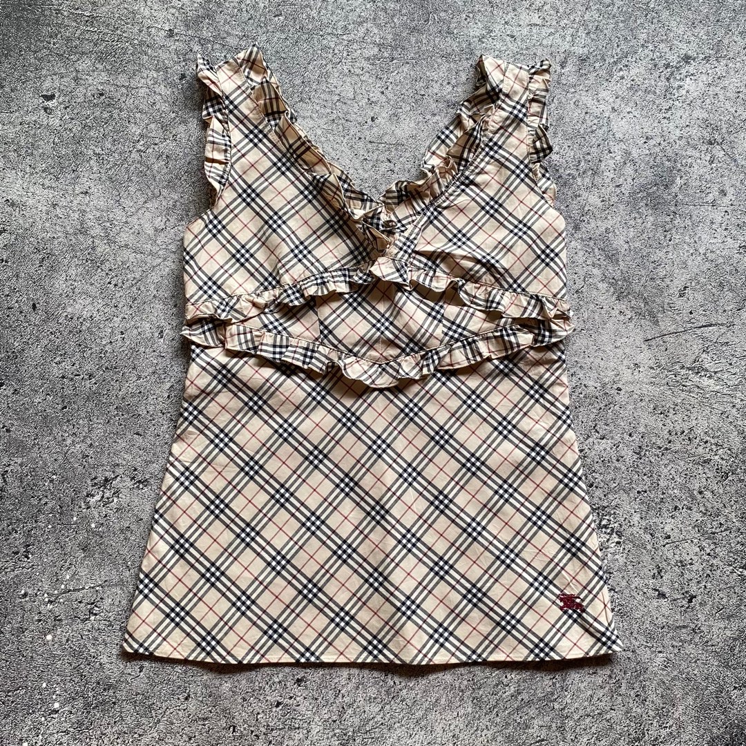 Burberry Nova Check Ruffle Sleeveless Top, Fesyen Wanita, Pakaian ...