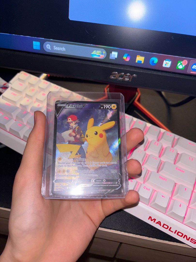 Pokemon Trainer Pikachu V Card, Hobbies & Toys, Toys & Games on Carousell
