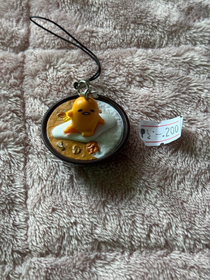 Sanrio Gudetama curry keychain, Everything Else, Others on Carousell