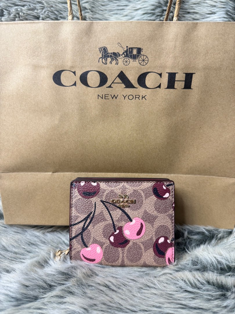 Coach cherry bifold wallet, Luxury, Bags & Wallets on Carousell