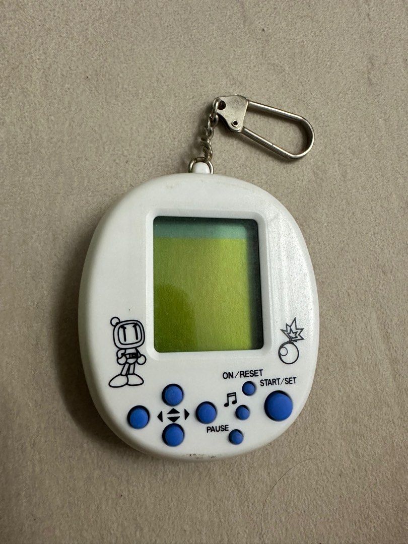 Vintage bomberman keychain handheld games portable nintendo atari ...