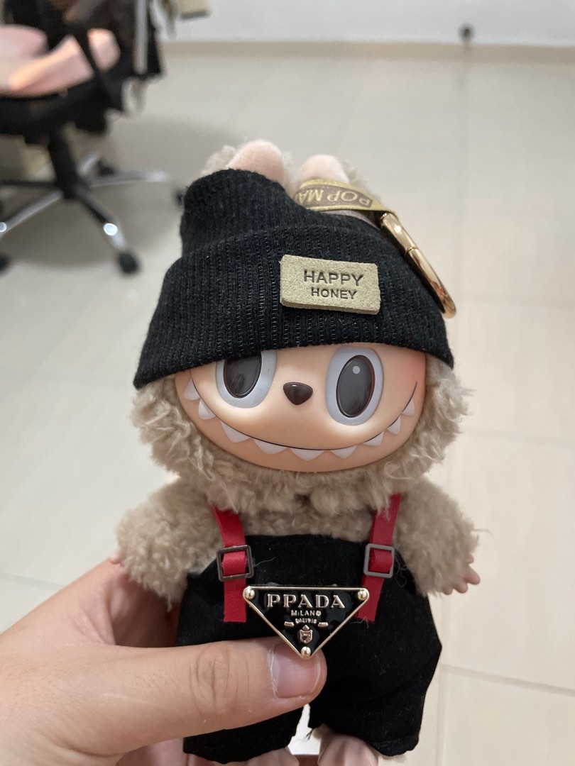 Labubu v1 in Prada outfit, Hobbies & Toys, Toys & Games on Carousell
