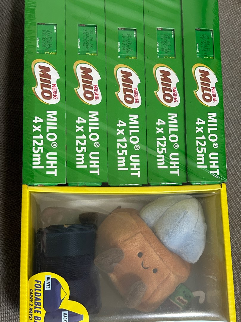 Milo plush with uht Milo, Hobbies & Toys, Toys & Games on Carousell