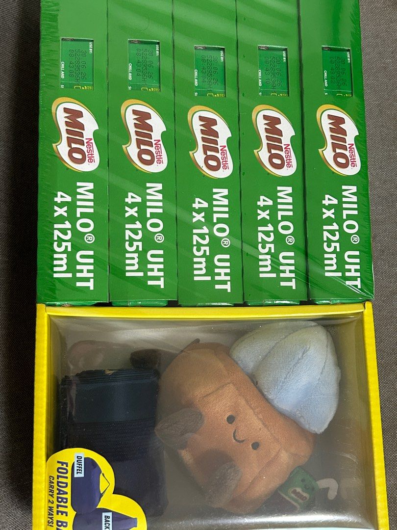 Milo plush with uht Milo, Hobbies & Toys, Toys & Games on Carousell