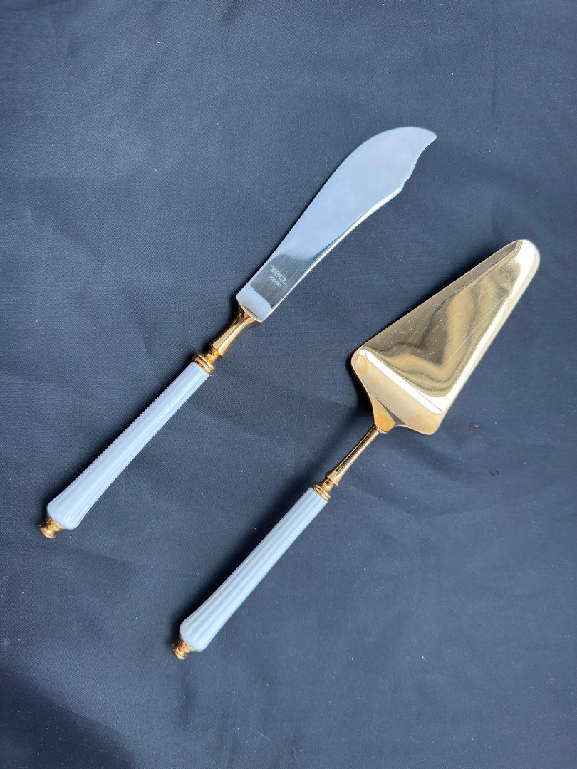 TBCL Japan butter knives, with one featuring a gold handle and the ...