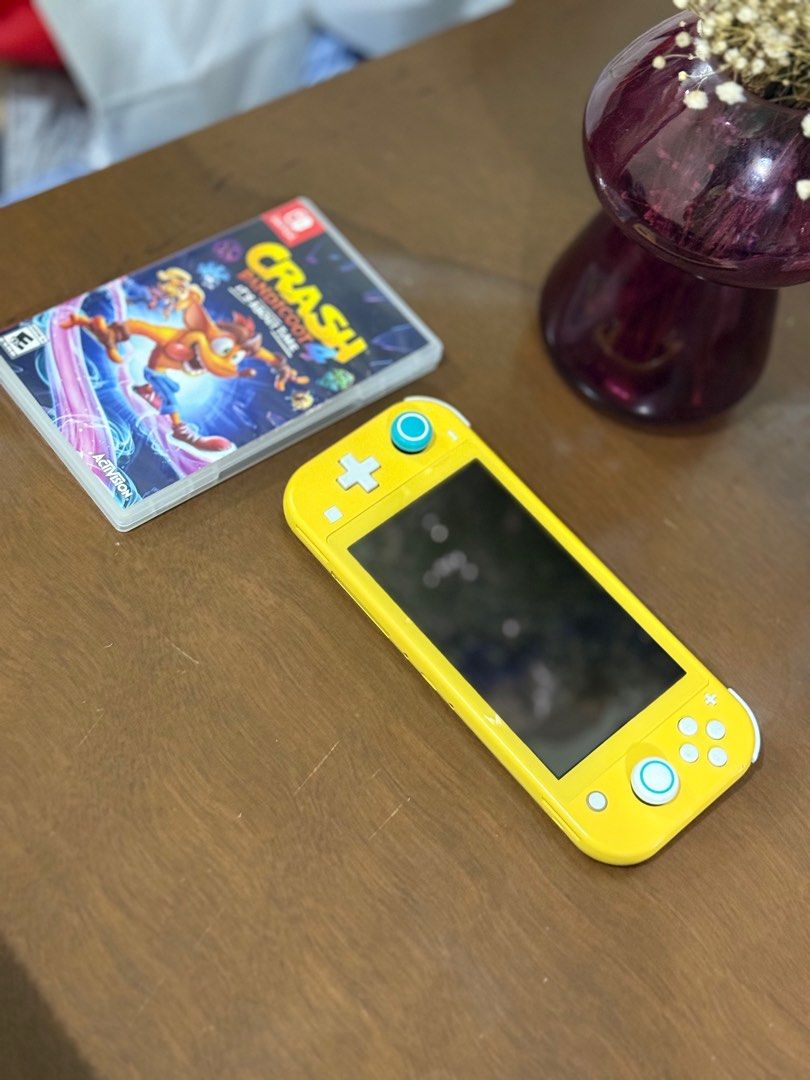 Nintendo Switch Lite Yellow with Crash Bandicoot, Video Gaming, Video ...