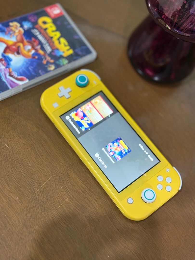 Nintendo Switch Lite Yellow with Crash Bandicoot, Video Gaming, Video ...