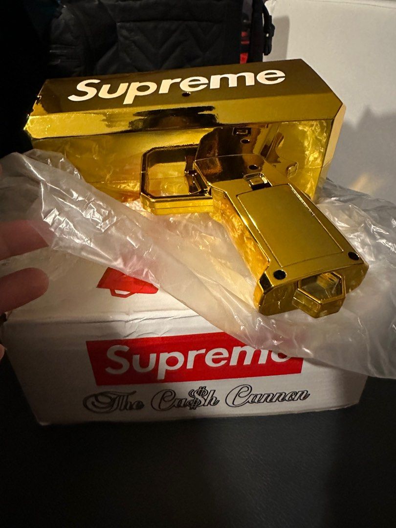 Supreme gold cash gun, Hobbies & Toys, Toys & Games on Carousell