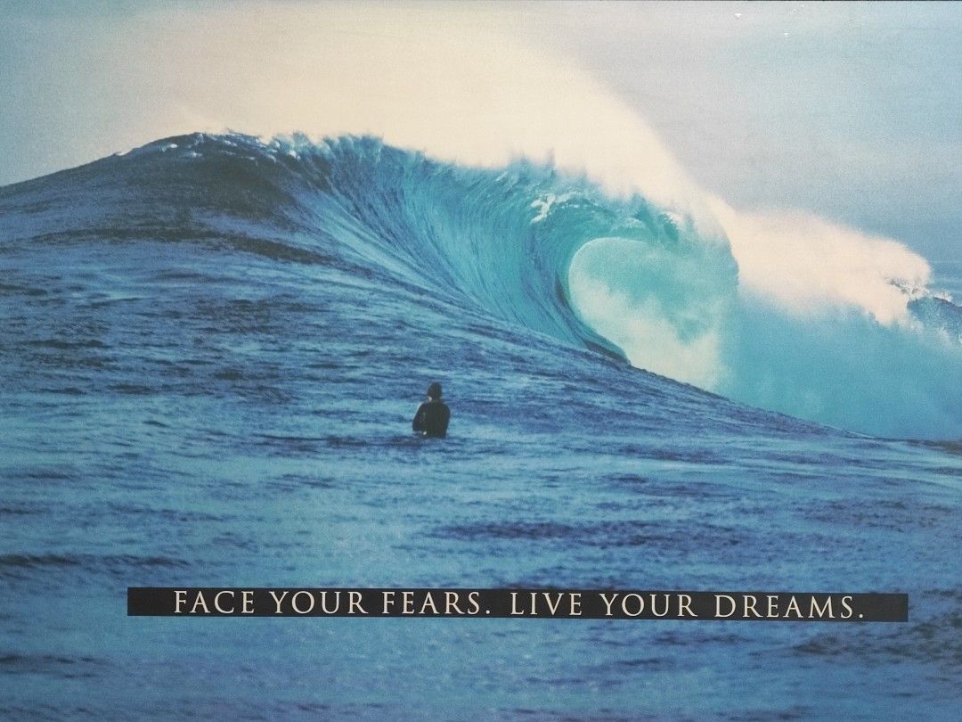 Wooden Frame with poster featuring a large ocean wave and a lone surfer ...