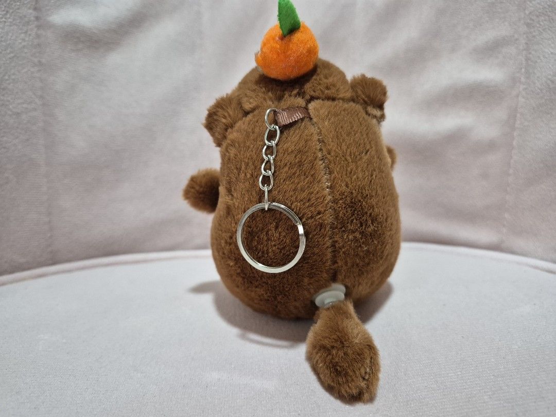 Capybara Plushie with Orange Hat, Hobbies & Toys, Toys & Games on Carousell