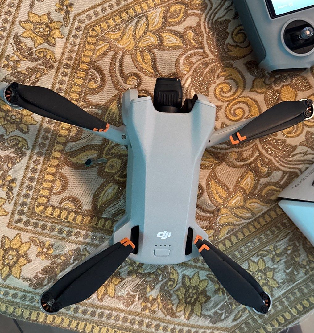 DJI Mini 3 Drone with RC Controller, Photography, Drones on Carousell