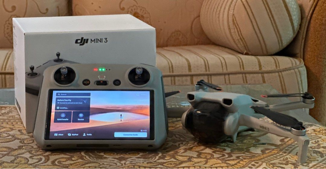 DJI Mini 3 Drone with RC Controller, Photography, Drones on Carousell