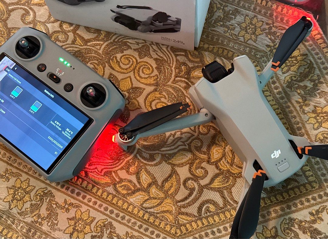 DJI Mini 3 Drone with RC Controller, Photography, Drones on Carousell
