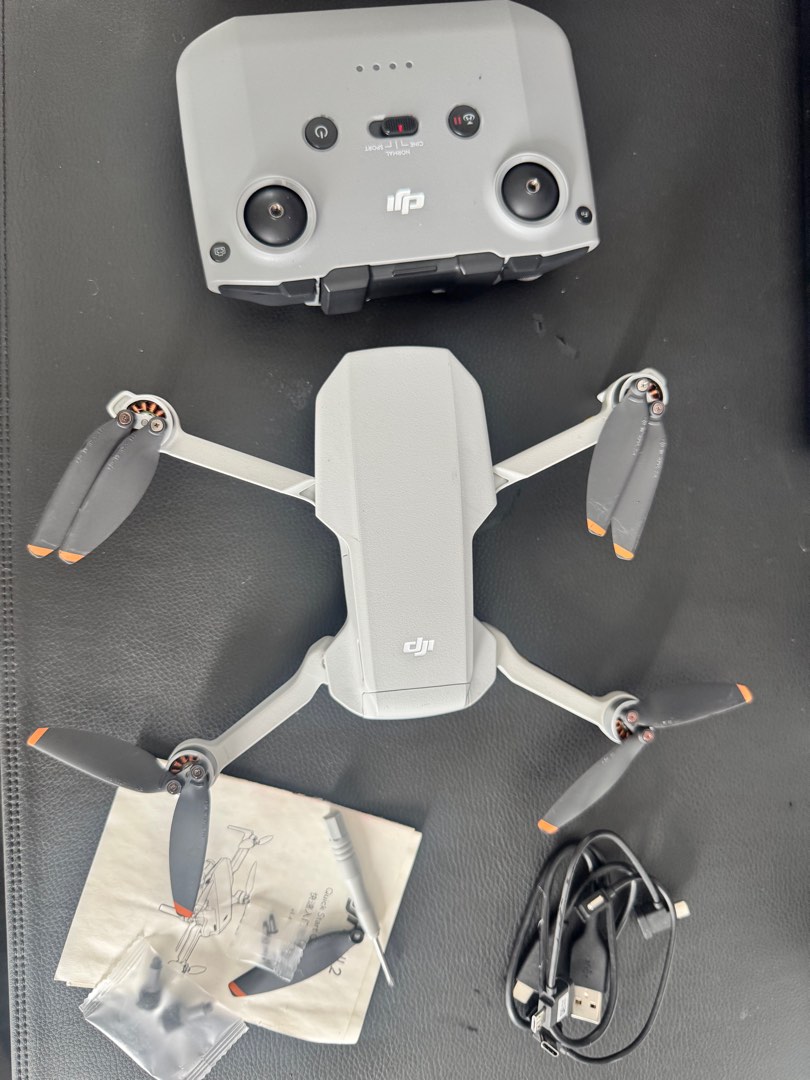 DJI Mini 2 Drone - with Free Case, Photography, Drones on Carousell