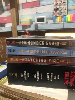 The Hunger Games Trilogy by Suzanne Collins, Hobbies & Toys, Books ...