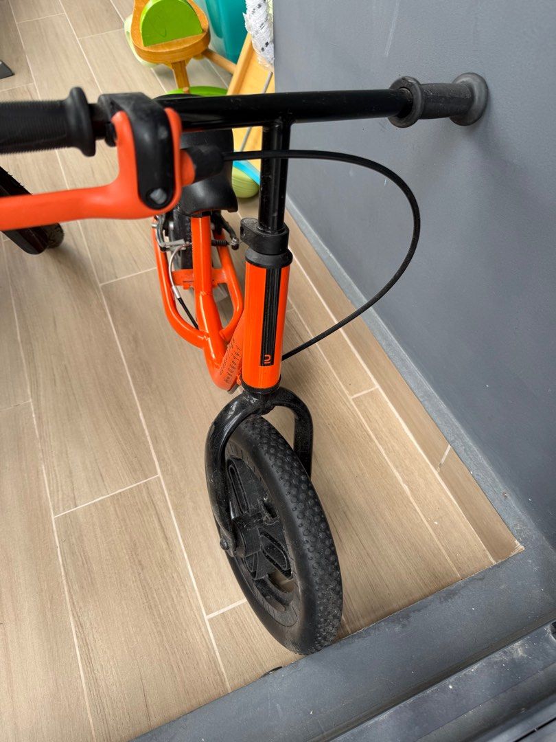 BTWIN Balance Bike - Orange, Sports Equipment, Bicycles & Parts, Bicycles on Carousell