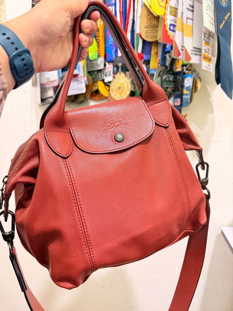 Authentic Longchamp Le Pliage Cuir top handle bag in a red/terracotta ...