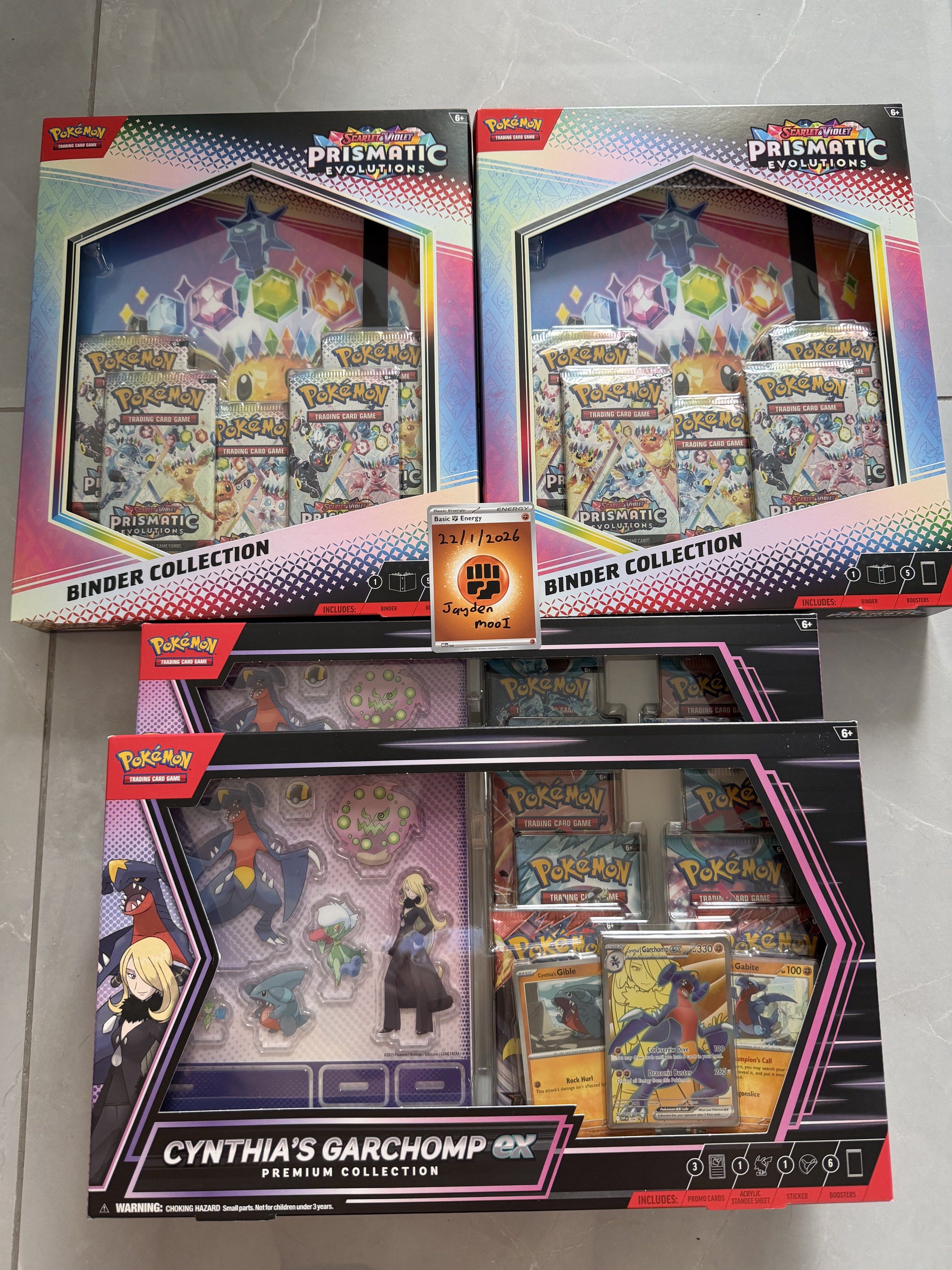 Pokemon Prismatic Evolutions Binder Collection & Cynthia's Garchomp EX ...
