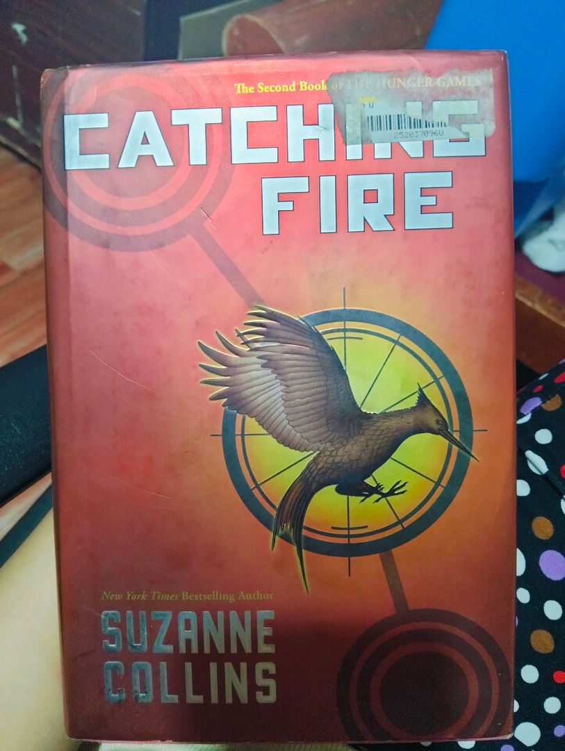 Catching Fire by Suzanne Collins, Hobbies & Toys, Books & Magazines ...