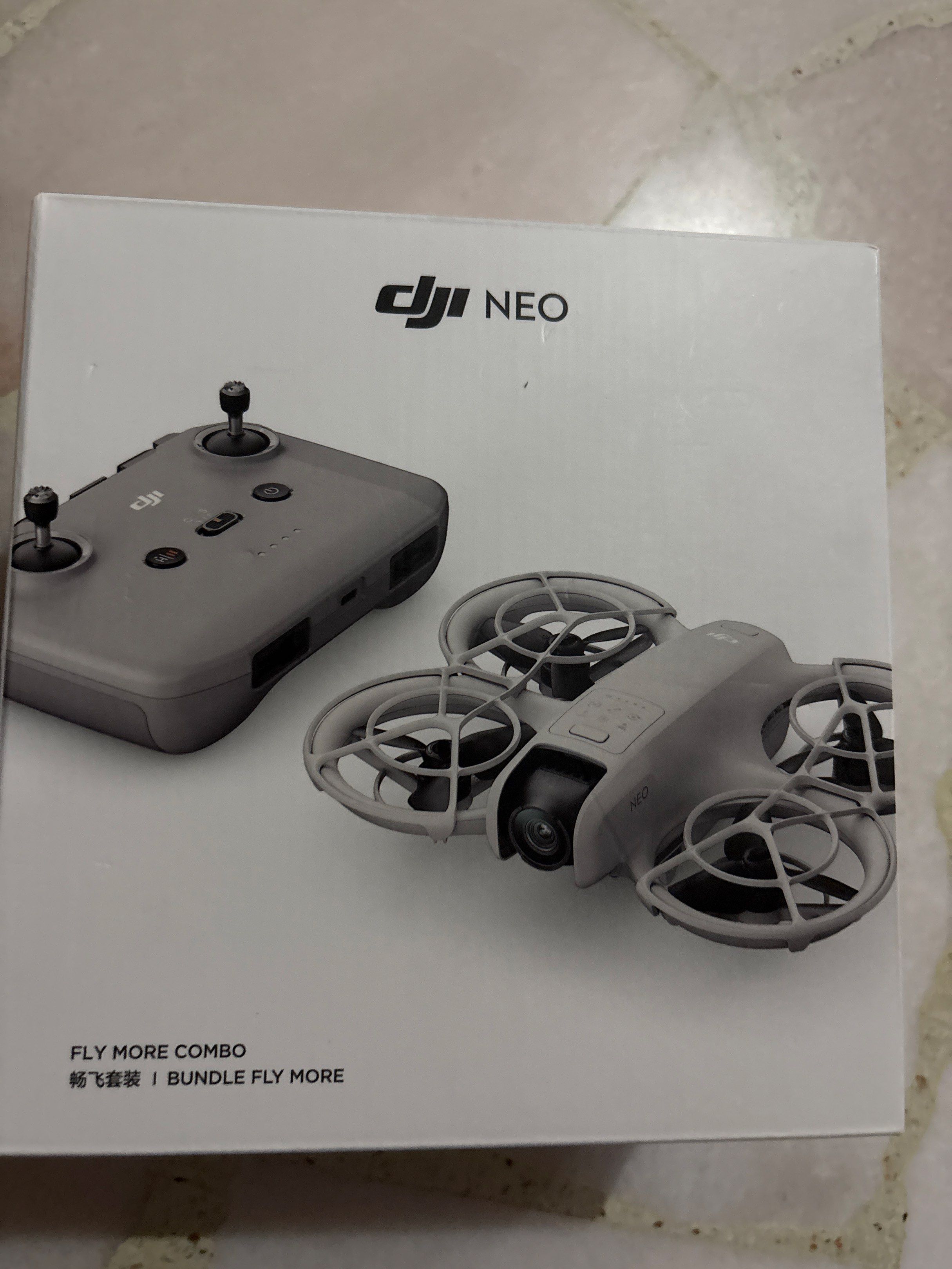 DJI Neo Fly More Combo Drone, Photography, Drones on Carousell