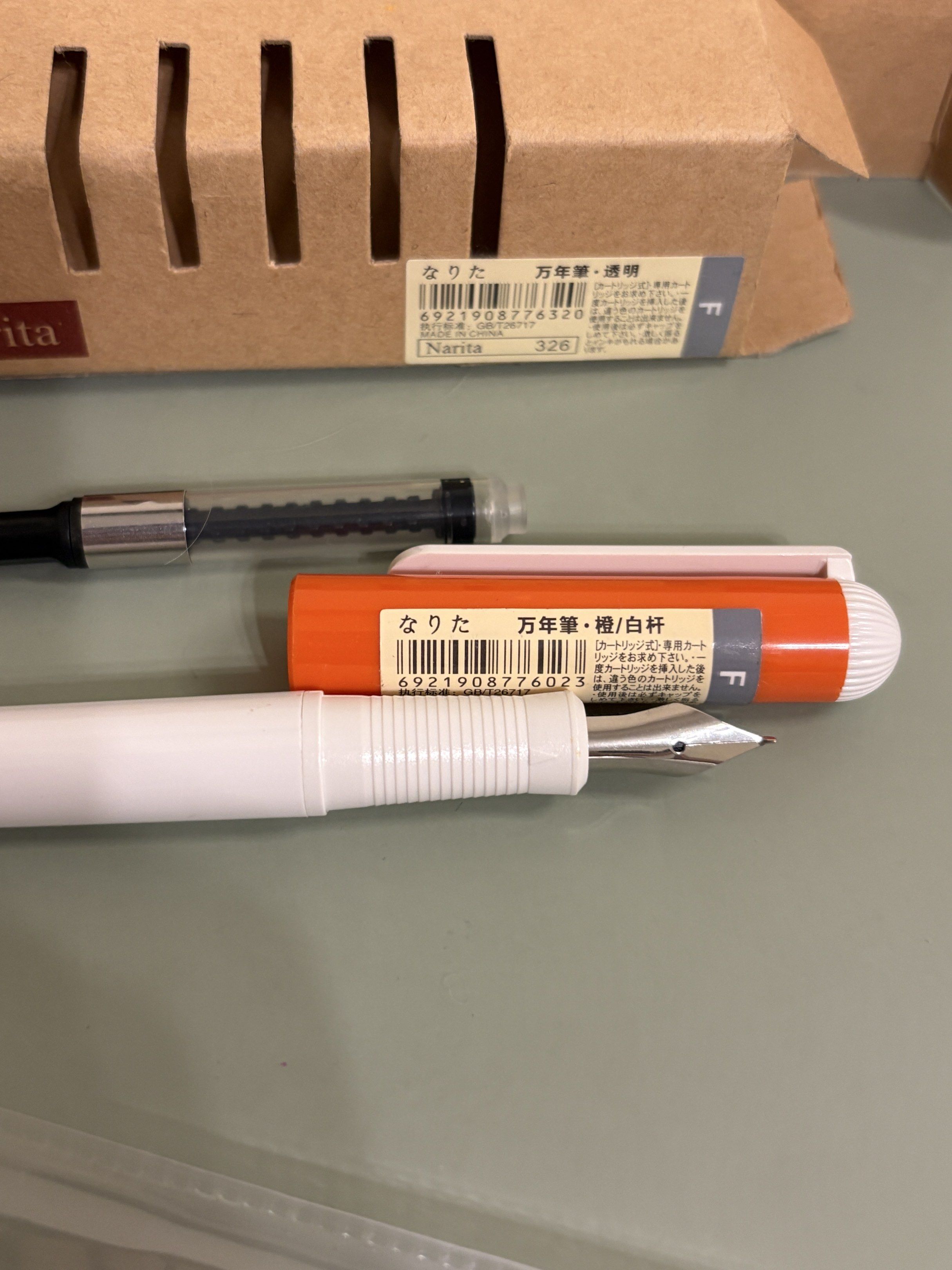 [ $2] Narita Fountain Pen - White/Orange, Hobbies & Toys, Stationery ...