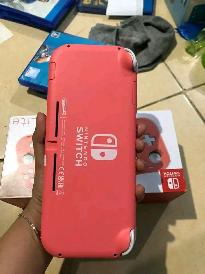 Nintendo Switch Lite Pink Coral, Video Game, Konsol di Carousell