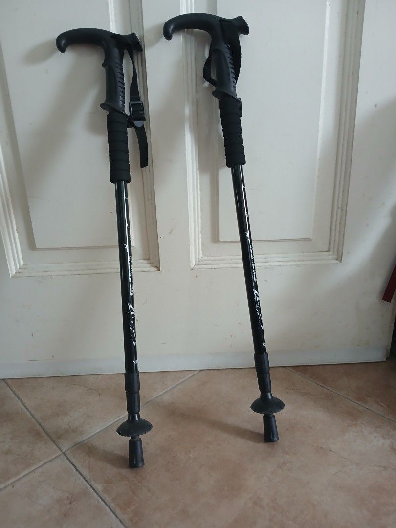 Black Trekking Poles, Sports Equipment, Hiking & Camping on Carousell