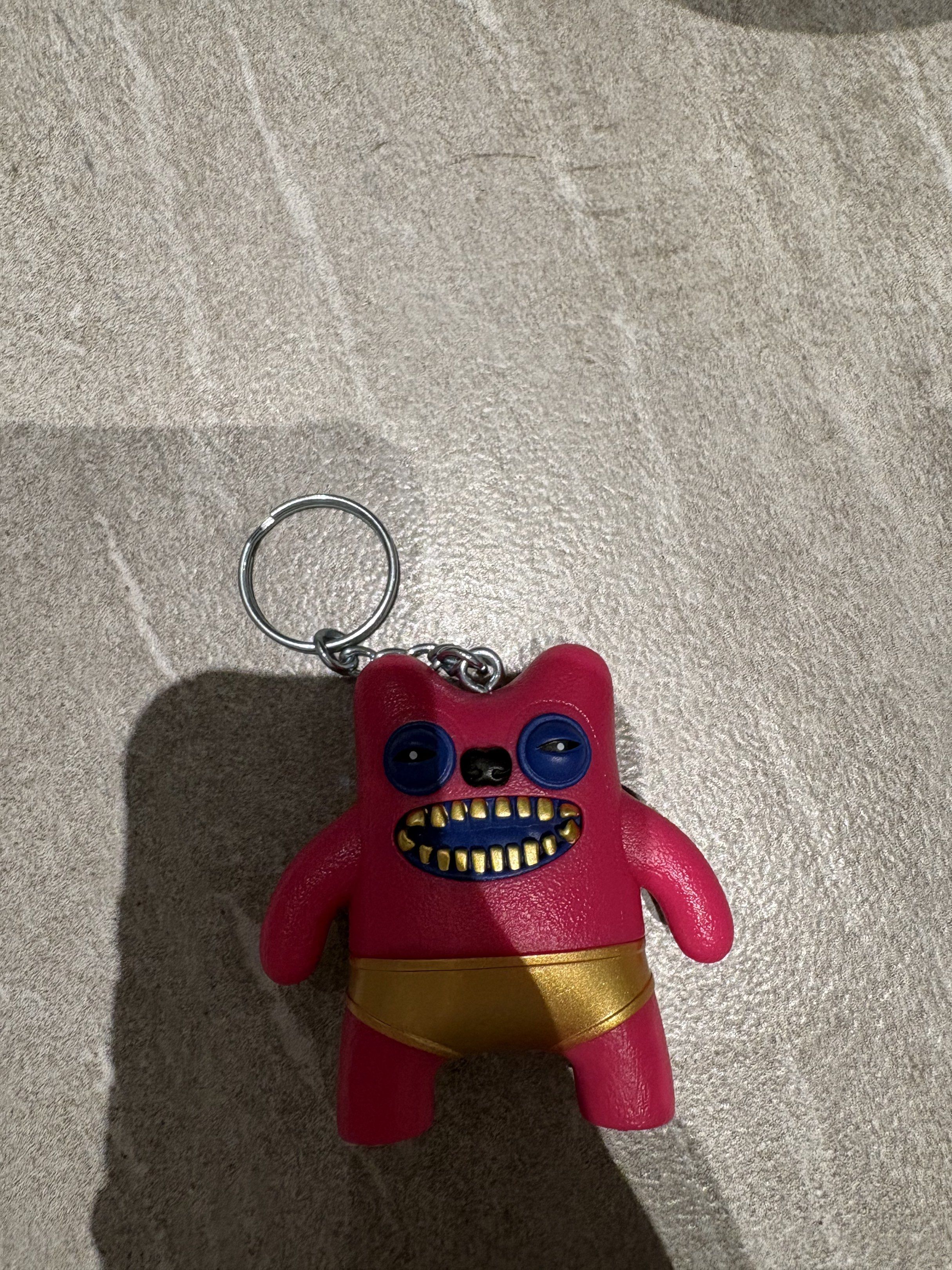 Pink Fuggler Keychain, Hobbies & Toys, Toys & Games on Carousell