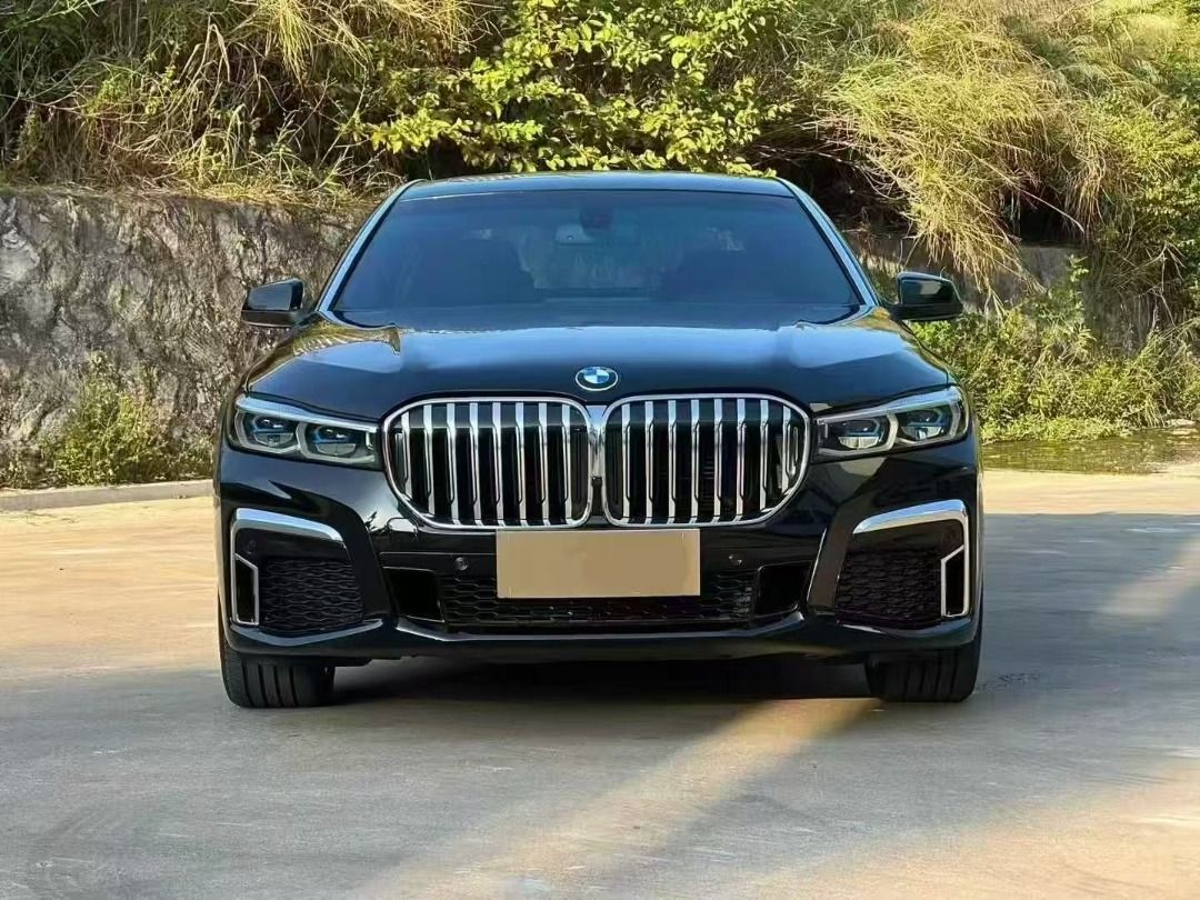 BMW 7 Series 2009-2015 upgraded with G12 sports body kit; old model ...