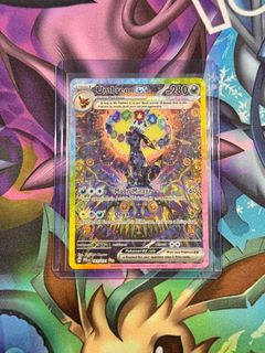 Prismatic evolution espeon tin, Hobbies & Toys, Toys & Games on Carousell