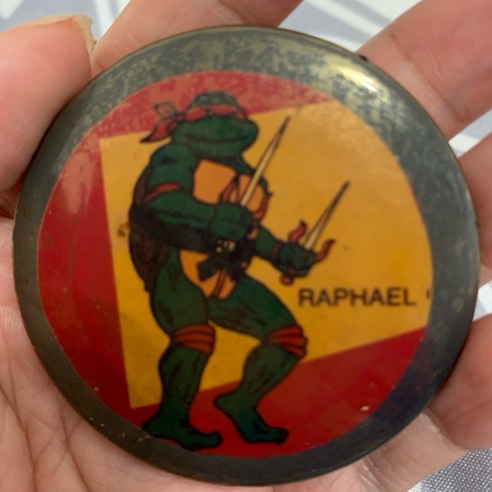 TMNT Raphael [red eye mask ninja turtle] in his signature pose wielding ...