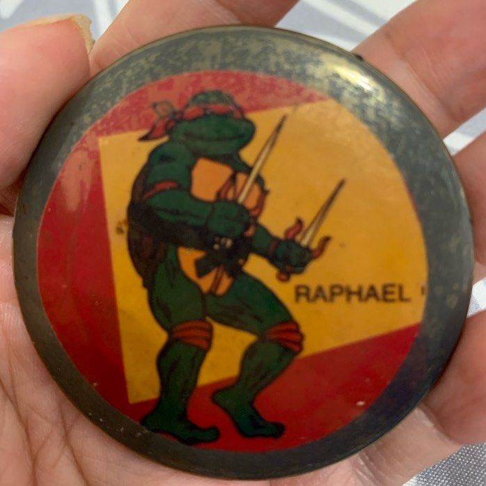 TMNT Raphael [red eye mask ninja turtle] in his signature pose wielding ...