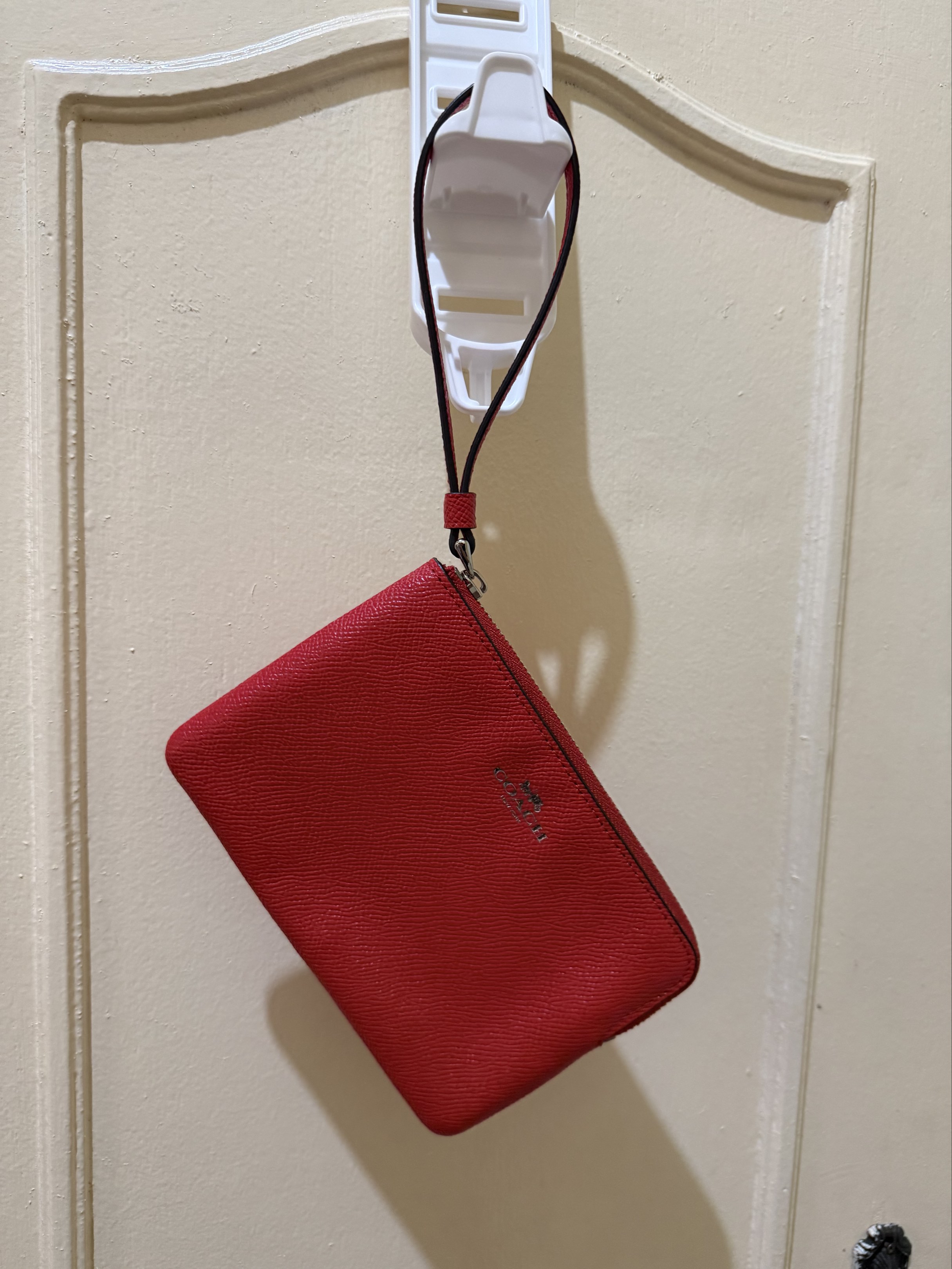 Preloved Coach Wristlet Red, Luxury, Bags & Wallets on Carousell
