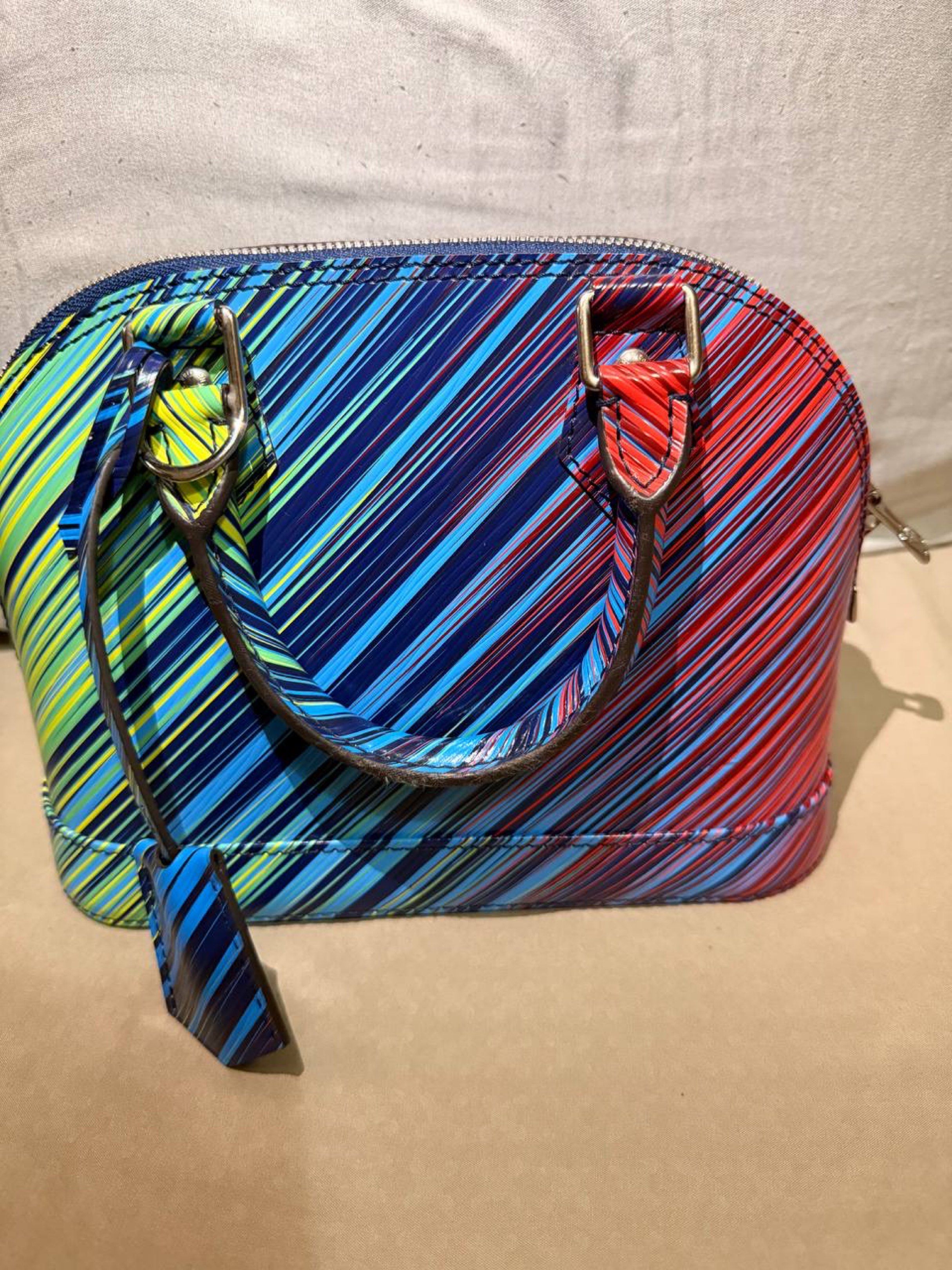 Louis Vuitton Alma BB Tropical Handbag, Luxury, Bags & Wallets on Carousell