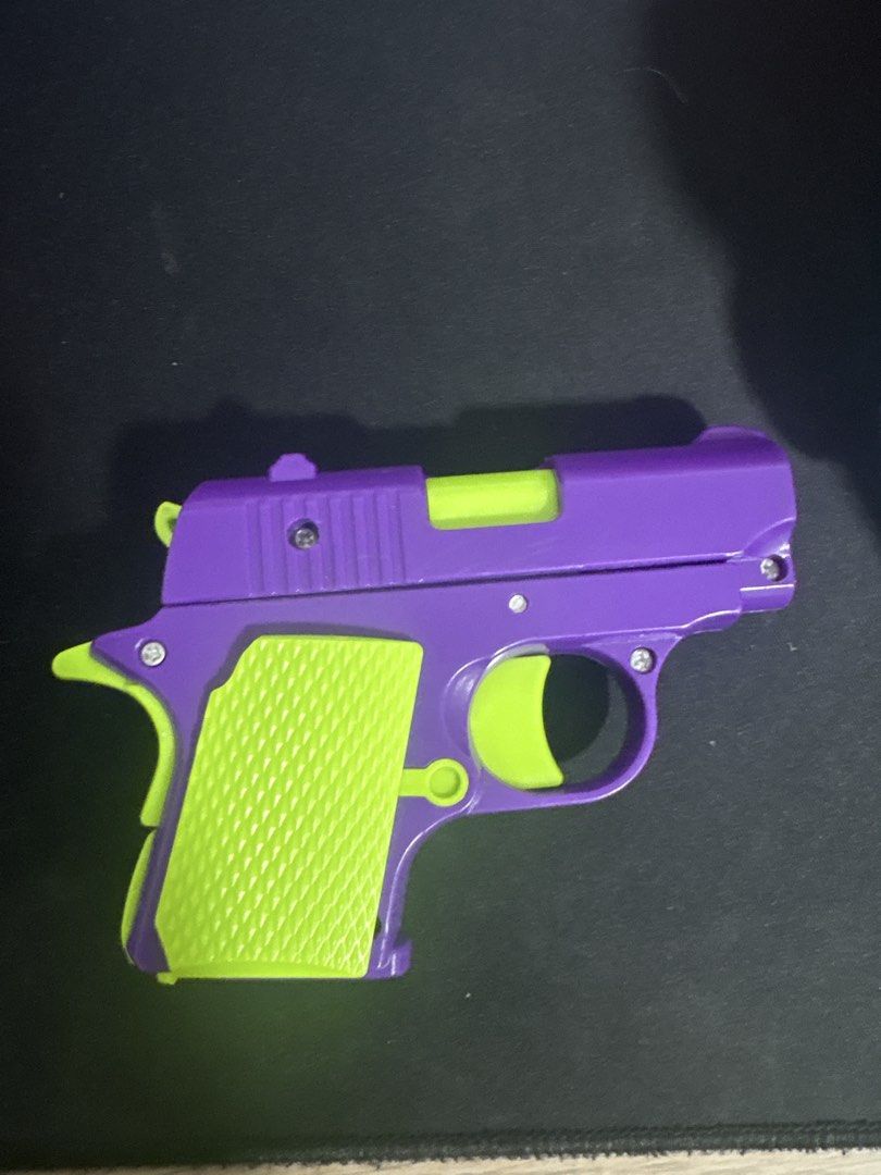 Nice purple and green figit gun toys (safe for kids), Hobbies & Toys ...
