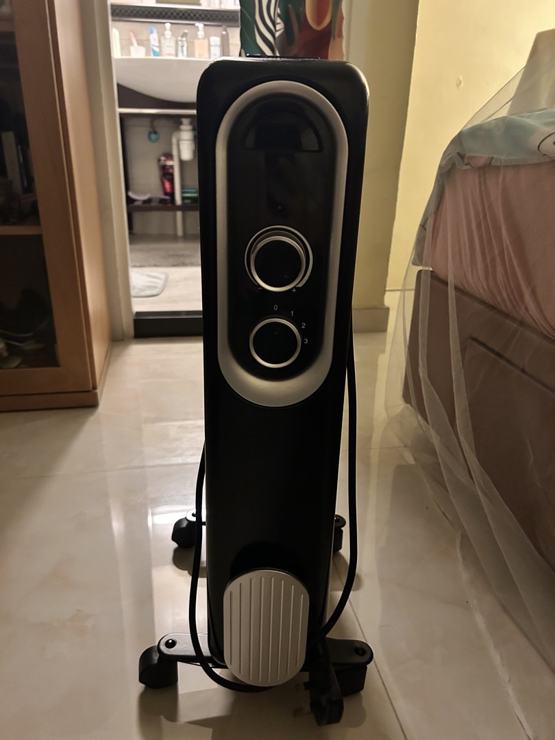 運油暖爐Oil Heater with 6 fins and with wheels, 家庭電器, 冷氣機及暖風機 - Carousell