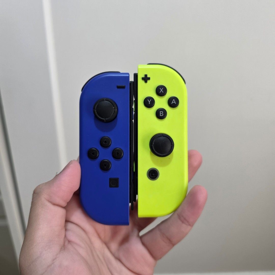 Nintendo Switch Joycons Blue and Neon Yellow, Video Gaming, Gaming ...